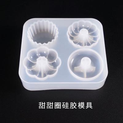 China Crystal Dropper Mold DIY Handmade Donut Mold Four Grid Creative Donut Silicone Mold for sale