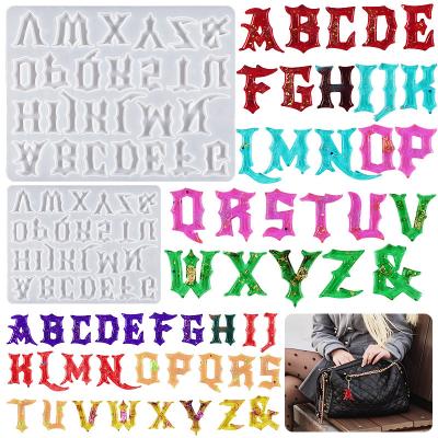 China DIY Gothic Alien English 26 Letter Full Page Drip Glue Grinder Aromatherapy Pendant Keychain Silicone Mold for sale