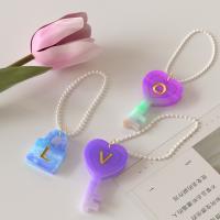 China DIY Crystal Dropping Resin 26 English Love Key Lock Pendant Jewelry Bracelet Silicone Mold for sale