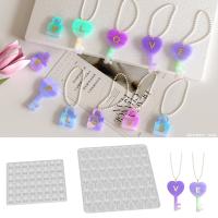 China DIY Crystal Dropping Resin 26 English Love Key Lock Pendant Jewelry Bracelet Silicone Mold for sale