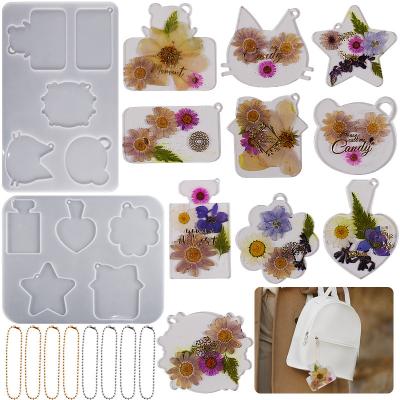 China Gutta Percha Resin Cat Bear Perfume Bottle Four Leaf Clover Five Pointed Star Peach Heart Pendant Hang Tag Silicone Mold for sale