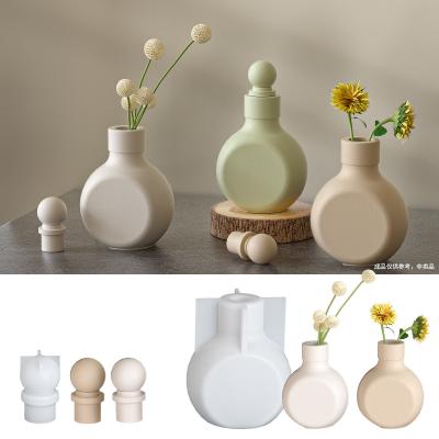 China DIY Resin Drip Glue Drift Bottle Vase Flower Ware Silicone Mold Aromatherapy Gypsum Candle Holder Ornament Grinder for sale