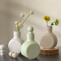 China DIY Resin Drip Glue Drift Bottle Vase Flower Ware Silicone Mold Aromatherapy Gypsum Candle Holder Ornament Grinder for sale