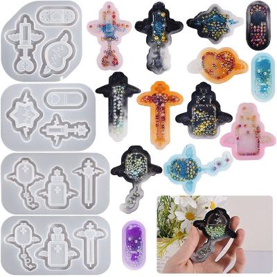 China DIY Crystal Dropper Gum Mirror Demon Angel Quicksand Pendant Keychain Pendant Silicone Mold for sale