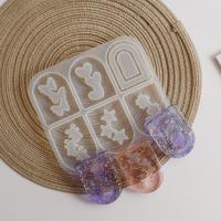China DIY Love Arch Bear Butterfly Star Flower Flowing Sand Pendant Keychain Dropping Silicone Mold for sale