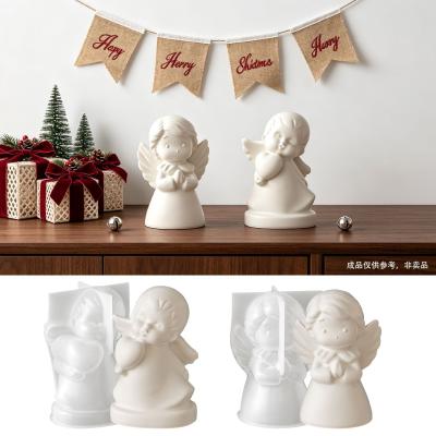 China Silicone Mold For Christmas Little Angel, DIY Aroma Candle Plaster Mold Featuring A Hugging, Praying Angel With A Heart for sale