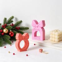 China Hollow-out Bowknot Candy Gift Tag Silicone Mold DIY Aroma Diffuser Pendant Epoxy Mold for sale