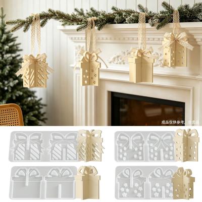 China Erlian Christmas Hollow Star Dot Striped Bow Gift Box Aromatherapy Gypsum Silicone Mold for sale