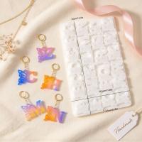 China Butterfly 26 English Letter Silicone Mold DIY Drip Resin Keychain Pendant Letter Mold for sale