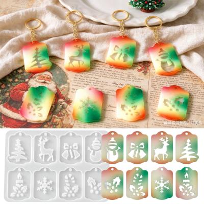 China Christmas Hollow Hanging Tag Silicone Mold, Reindeer Snowflake Christmas Tree Drip Glue Keychain Aromatherapy Sheet Mold for sale