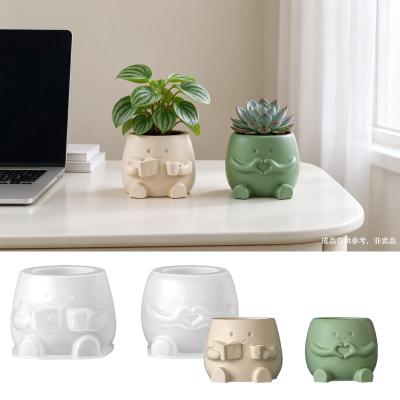 China Bixin Reading Cartoon Character Flower Pot Mold DIY Aromatherapy Gypsum Candle Cup Flower Utensil Silicone Mold for sale