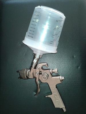 China PP Spray gun plastic paint mixing cup with liner for sale