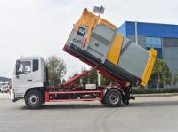 China Dongfeng 5 Ton Hydraulic Lifter Hook Lift Waste Roll on Roll off Dumpster Truck With Bin Garbage Truck for sale