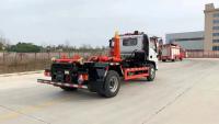 China 4*2 Lift Hook Swing Arm Garbage Transport Compactor Truck in 5620mm*2100mm*2300mm Dimensions for sale