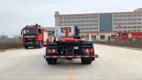 China 4*2 Lift Hook Swing Arm Garbage Transport Compactor Truck in 5620mm*2100mm*2300mm Dimensions for sale