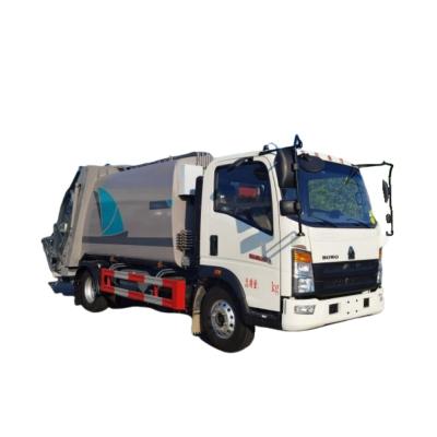 China Manual Transmission Sinotruk Howo Garbage Truck Post-loading Truck with Weichai 140 HP Compression Euro 4 for sale