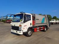 China Manual Transmission Sinotruk Howo Garbage Truck Post-loading Truck with Weichai 140 HP Compression Euro 4 for sale