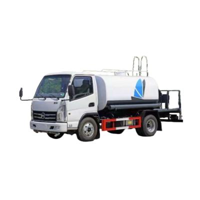 China Manual Transmission Type Small Water Tank Truck Sprinkler for Farm Cleaning and Road Landscaping Core Motor Component Model Tanker for sale