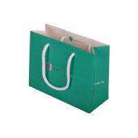 China 210gsm Coated Paper Packaging Bags For Clothing Gifts Groceries for sale