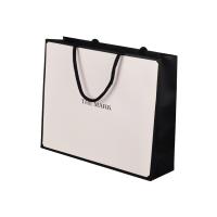 China Reusable Paper Packaging Bags 190gsm Artpaper SBS Paper Material for sale