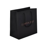 China 190gsm Paper Packaging Bags , Black Paper Gift Bags With Custom Gold Foil Stamping for sale