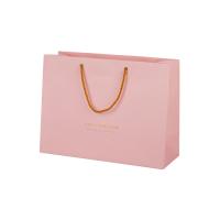 China Multipurpose Pink Custom Paper Shopping Bags With Plastic Clip Handle for sale