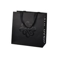 China Customized UV Coating Paper Packaging Bags With Flat Cotton Handle for sale