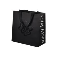 China Customized UV Coating Paper Packaging Bags With Flat Cotton Handle for sale