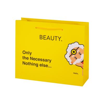 China Matt Lamination Yellow Paper Packaging Bags Square Shape for sale
