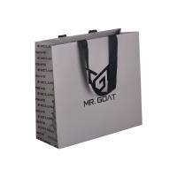 China Grey UV Art Paper Gift Bags Clothing Shopping Packaging With Handle for sale