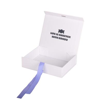 China Sturdy White Foldable Paper Magnetic Gift Boxes Packaging Product With Ribbon for sale