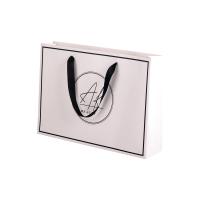 China Ribbon Handle Paper Packaging Bags for Clothing White Art Paper Offset Printing for sale