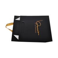 China Black Magnetic Folding Paper Boxes Packaging Gift With Ribbon Handle for sale