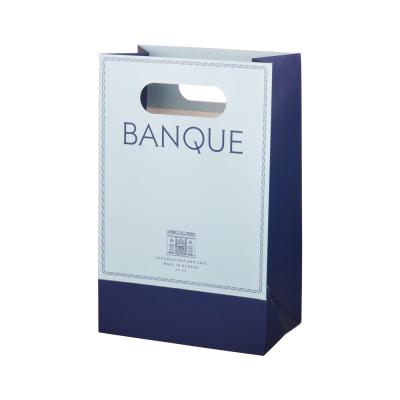 China Blue Cutting Handle Coated Paper Packaging Bags For Shopping Gift High Durability for sale