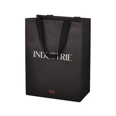 China Black Kraft Paper Gift Bags Clothing Shopping Packaging With Flat Cotton Handle for sale