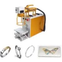 China 110mm Air Cooled Fiber Laser Marking Machine 20W Portable Desktop Metal Engraver for sale