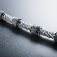 China Plastic Dia 8.3mm 9.0mm Wire Rope Diamond Beads for Stone Profiling Cutting Trimming for sale