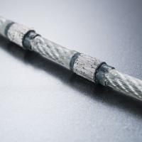 China Plastic Dia 8.3mm 9.0mm Wire Rope Diamond Beads for Stone Profiling Cutting Trimming for sale