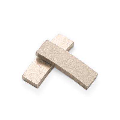 China Sintered Diamond Segment for Granite Sandstone Basalt and Volcanic Stone Cutting OBM for sale