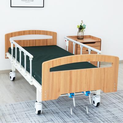 China Adjustable Manual Hospital Bed 2050x940mm Wooden Headboard with Rails 220kg Capacity for sale