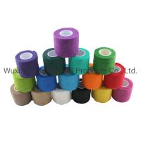 China Red Non Woven Cohesive Bandage Medical Compression Self-Adhering Flexible Protect Body Parts for sale