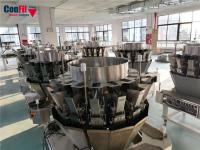 China Screw Feeding Multihead Weigher for Pickles & Vegetables - 14-16 Heads, 12-1200g Range, 60-85 Cycles/Min for sale