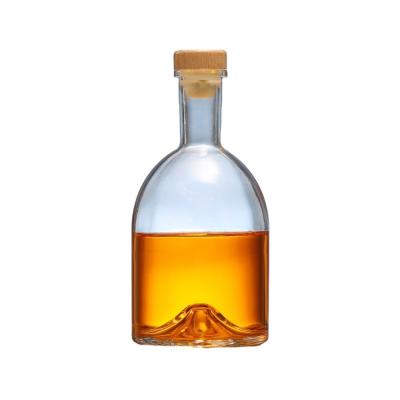 China Round Empty Flint Glass Tequila Gin Whiskey Vodka Bottle with Crystal White Material for sale