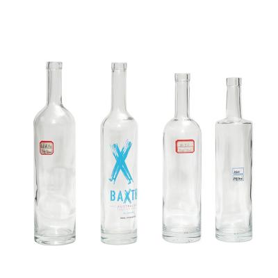 China Super Flint Glass Material Custom 700ml Liquor Wine Gin Whisky Vodka Spirits Glass Bottle with Cork Lid for sale