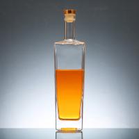 China Customized 750ml Vodka Liquor Glass Bottle with Stopper and Transparent Material for sale