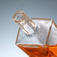 China Customized 750ml Vodka Liquor Glass Bottle with Stopper and Transparent Material for sale