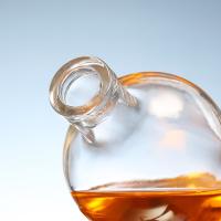 China Customized 750ml Vodka Liquor Glass Bottle with Stopper and Transparent Material for sale