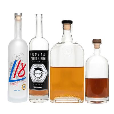 China Sample Freely Industrial 300ml 750ml 1L Empty Glass Liquor Wine Bottles with Cap for sale
