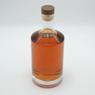 China Custom Super Round Super Flint Empty Cork Stopper 750ml Liquor Glass Vodka Bottle for sale