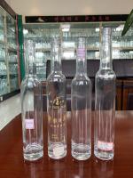 China Unique Light Blue Frosted Whiskey Gun Shaped 700ml 500ml Empty Gin Bottle for Alcohol for sale